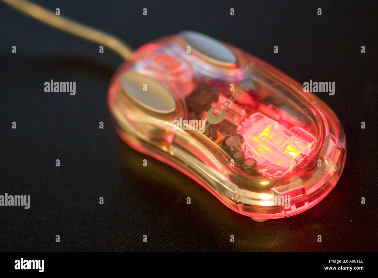 Illuminated computer mouse Stock Photo - Alamy