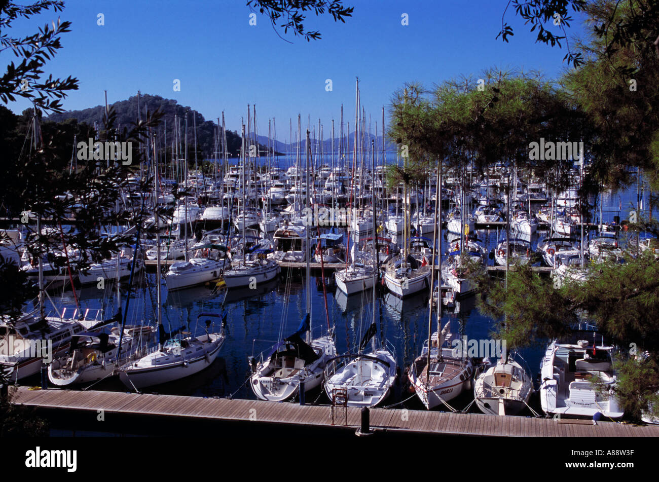 sailing boats in port gocek marina Stock Photo - Alamy