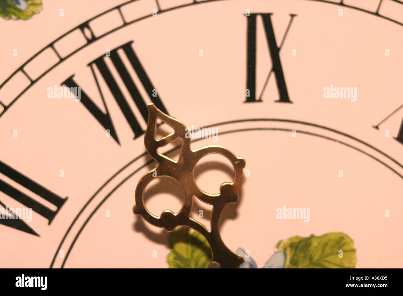 Clock hand at 11 Stock Photo - Alamy