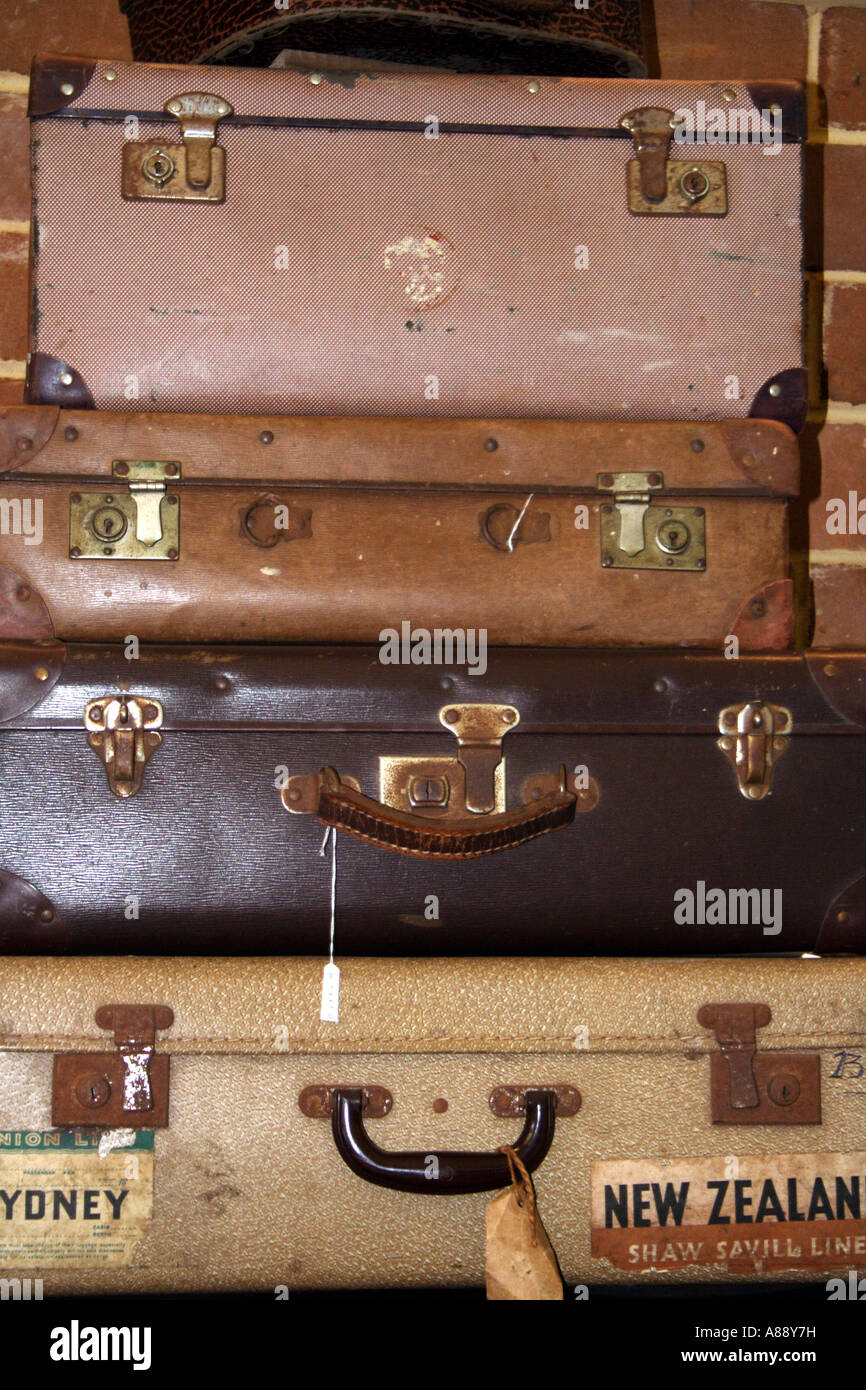 AN ARRAY OF OLD SUITCASES STACKED ON TOP OF EACH OTHER BDA10465 Stock ...