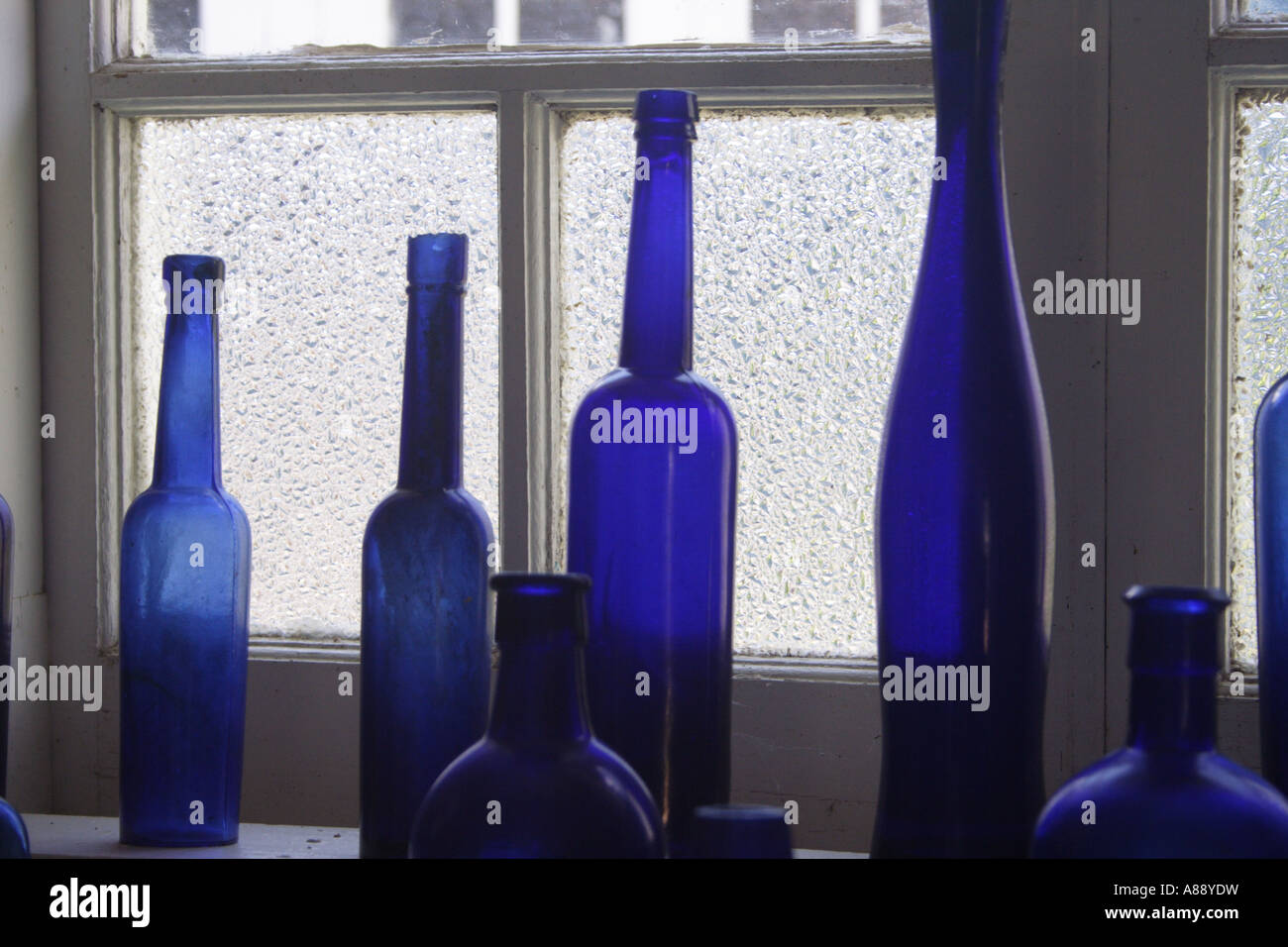 Alcohol bottles backlit display hi-res stock photography and images - Alamy