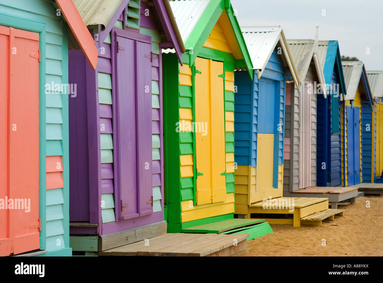 Brightly Coloured Beach Boxes on Brighton Beach Stock Photo - Alamy