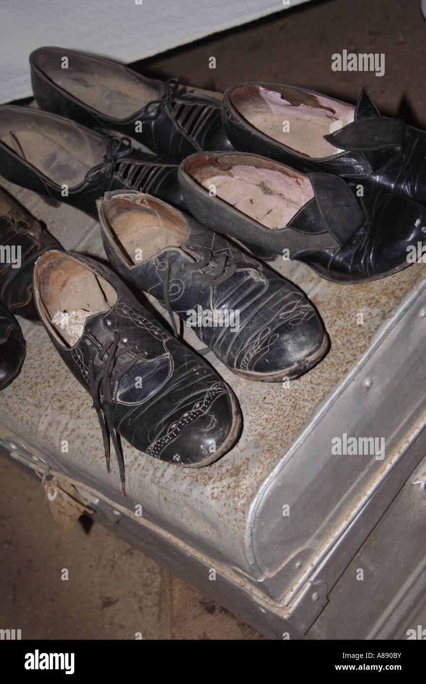 LOTS OF OLD SHOES BDA10587 VERTICAL Stock Photo - Alamy