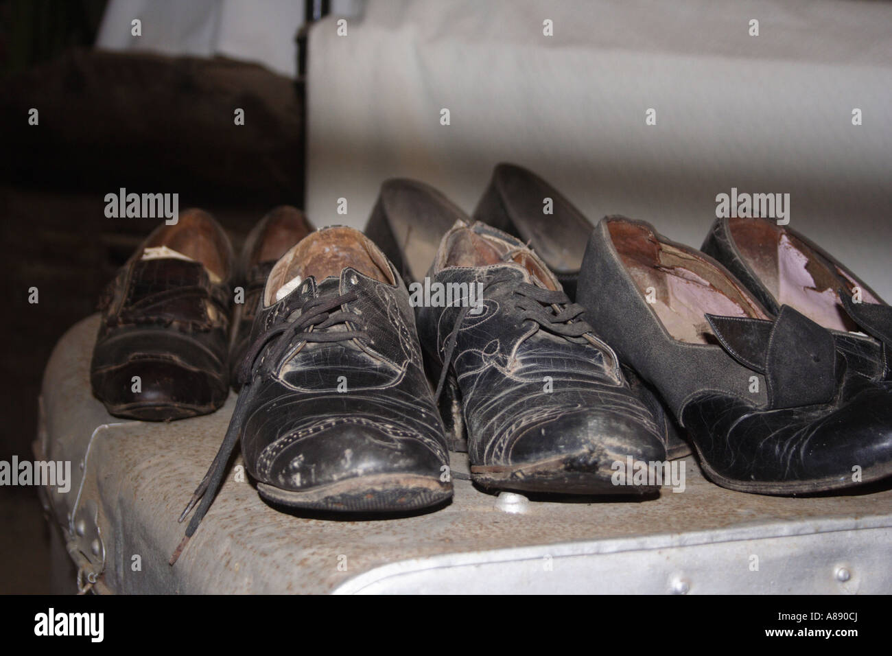 LOTS OF OLD SHOES BDA10588 HORIZONTAL Stock Photo - Alamy