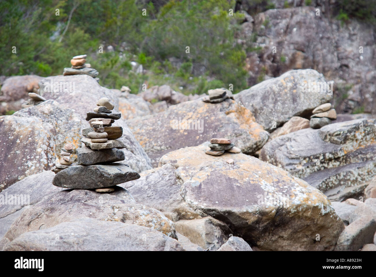 Abstract Stone Piles in River Bed Stock Photo - Alamy