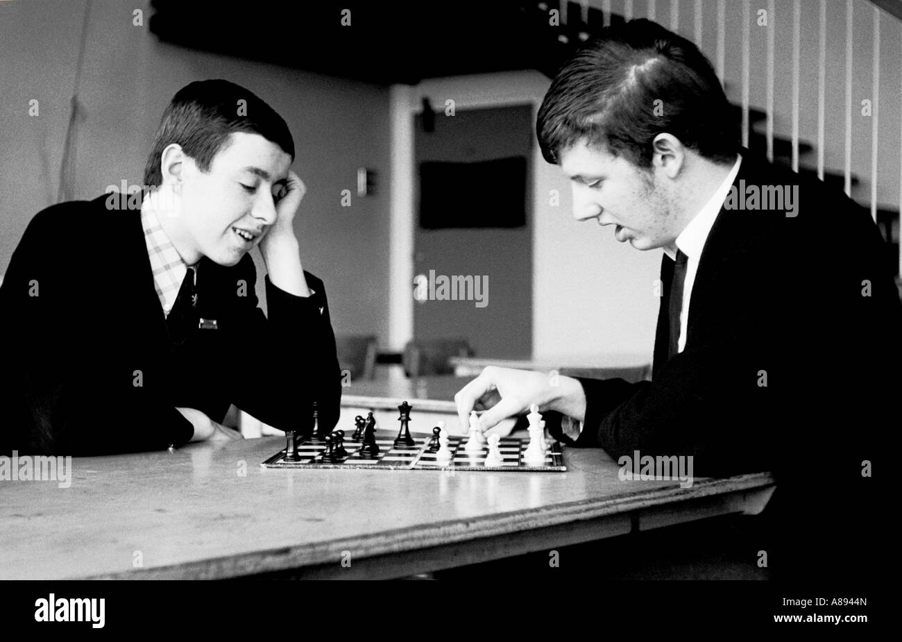 Students playing chess at school Stock Photo - Alamy