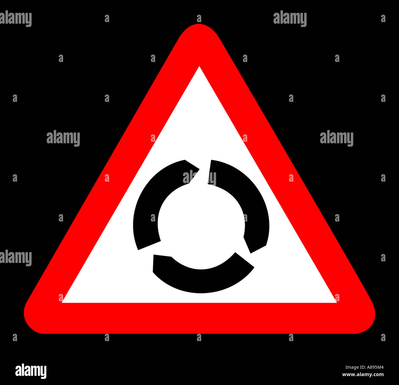 Roundabout road sign on black background Stock Photo - Alamy