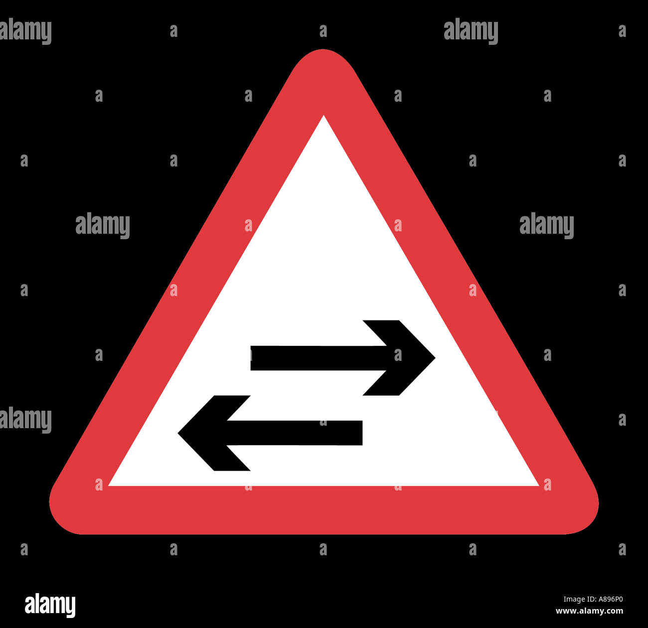 Two way traffic road sign on black background Stock Photo - Alamy
