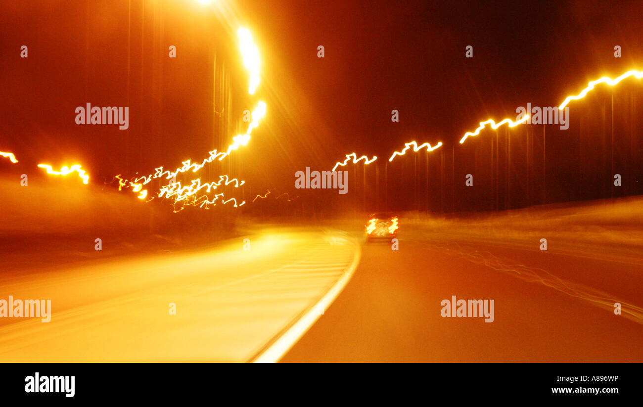 Soft focus fast car moving along a highway Stock Photo - Alamy