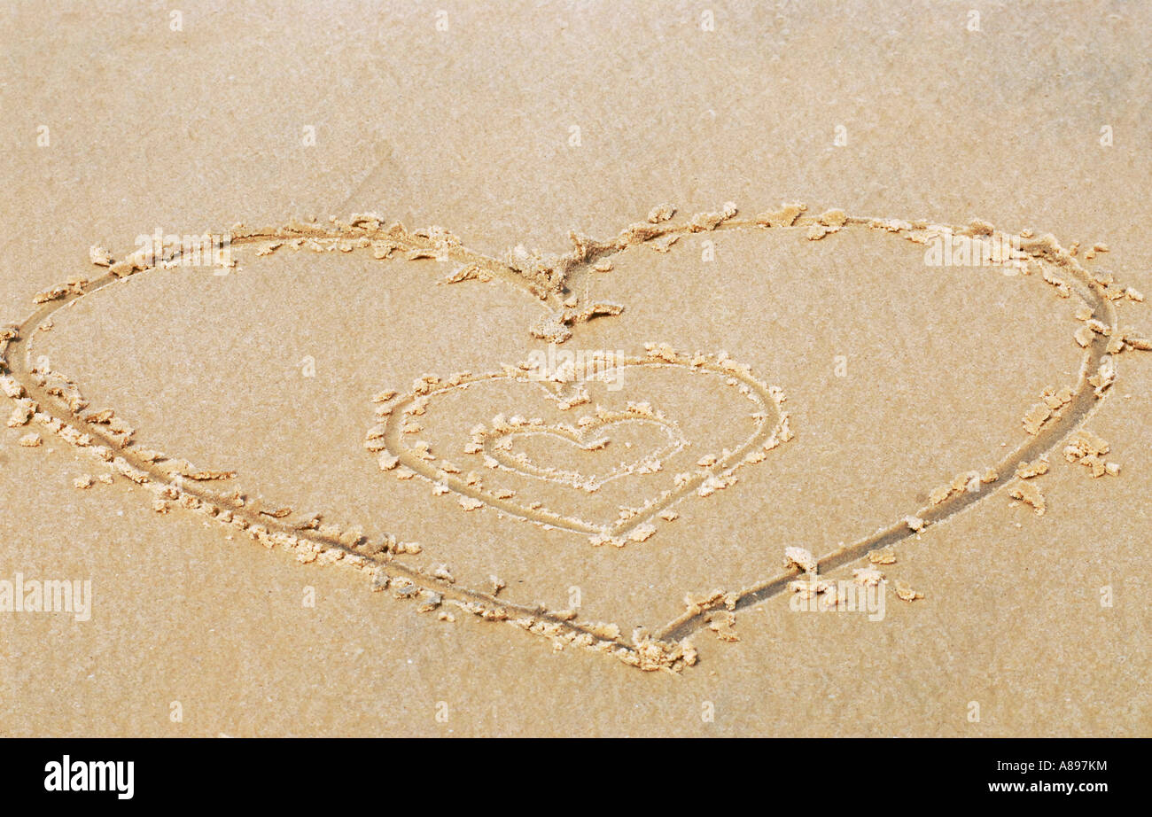 Heart in the sand Stock Photo - Alamy