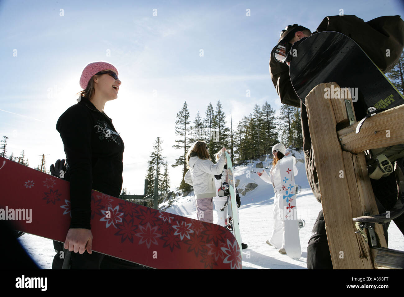Group of people standing on a ski slope Stock Photo - Alamy