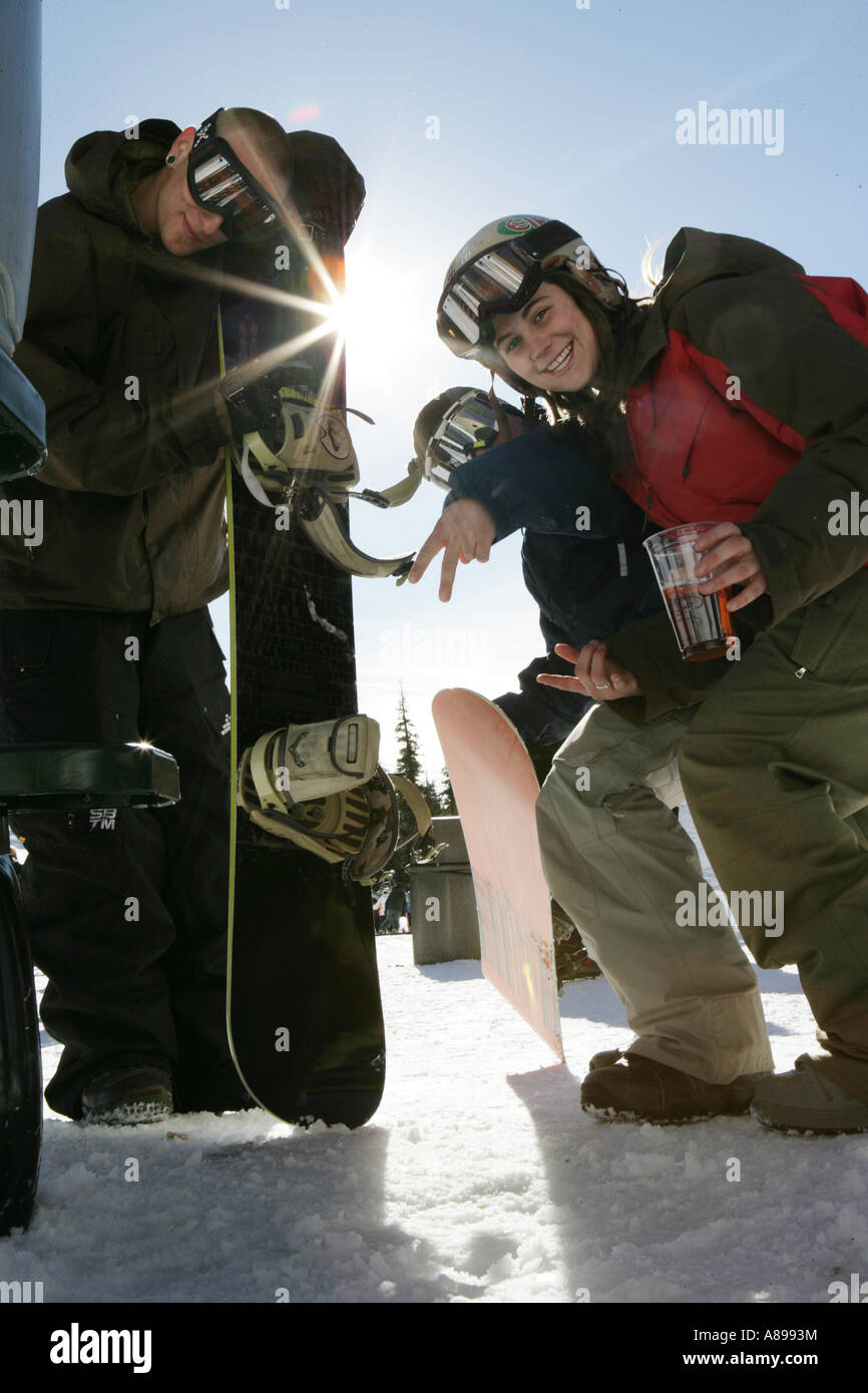 Young men posing for a picture on a ski slope Stock Photo - Alamy