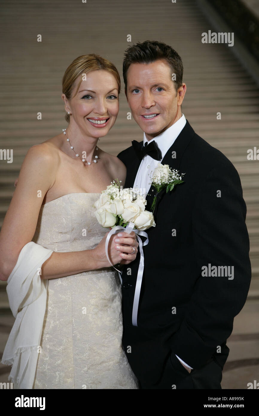 Boomer couple in wedding attire Stock Photo - Alamy