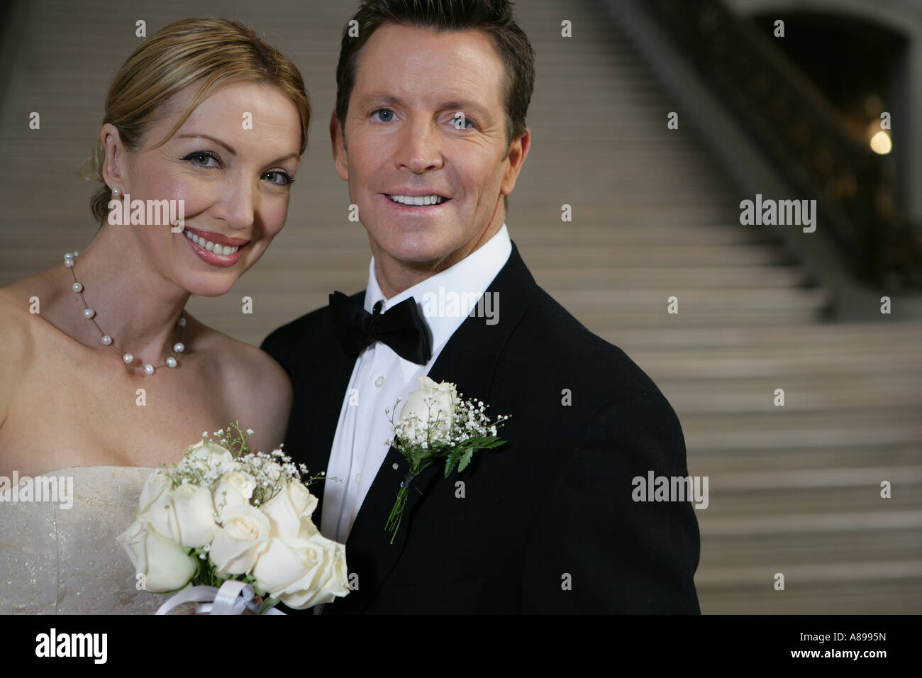 Newlyweds in wedding attire hi-res stock photography and images - Alamy