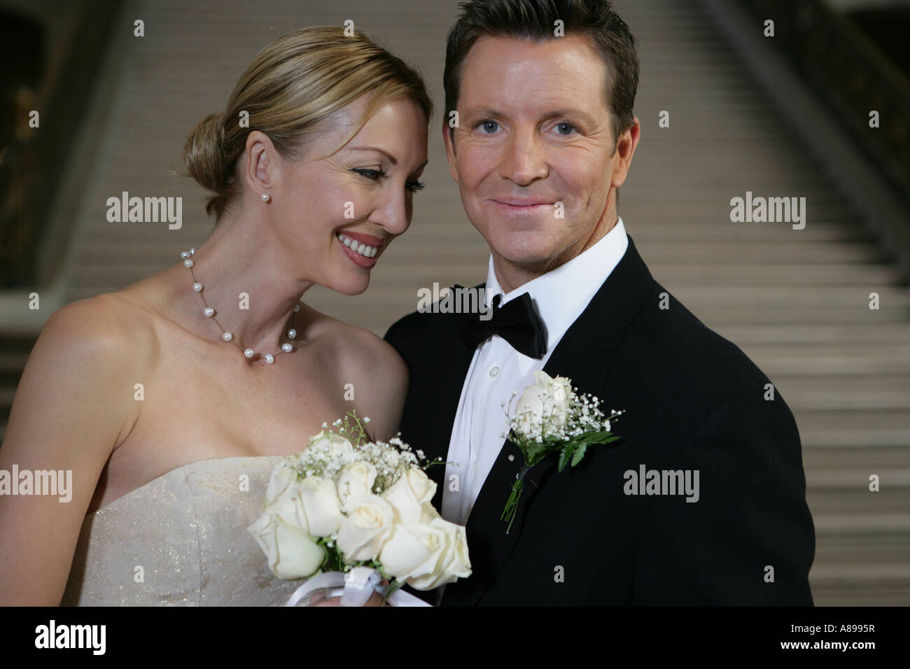Boomer couple in wedding attire Stock Photo - Alamy