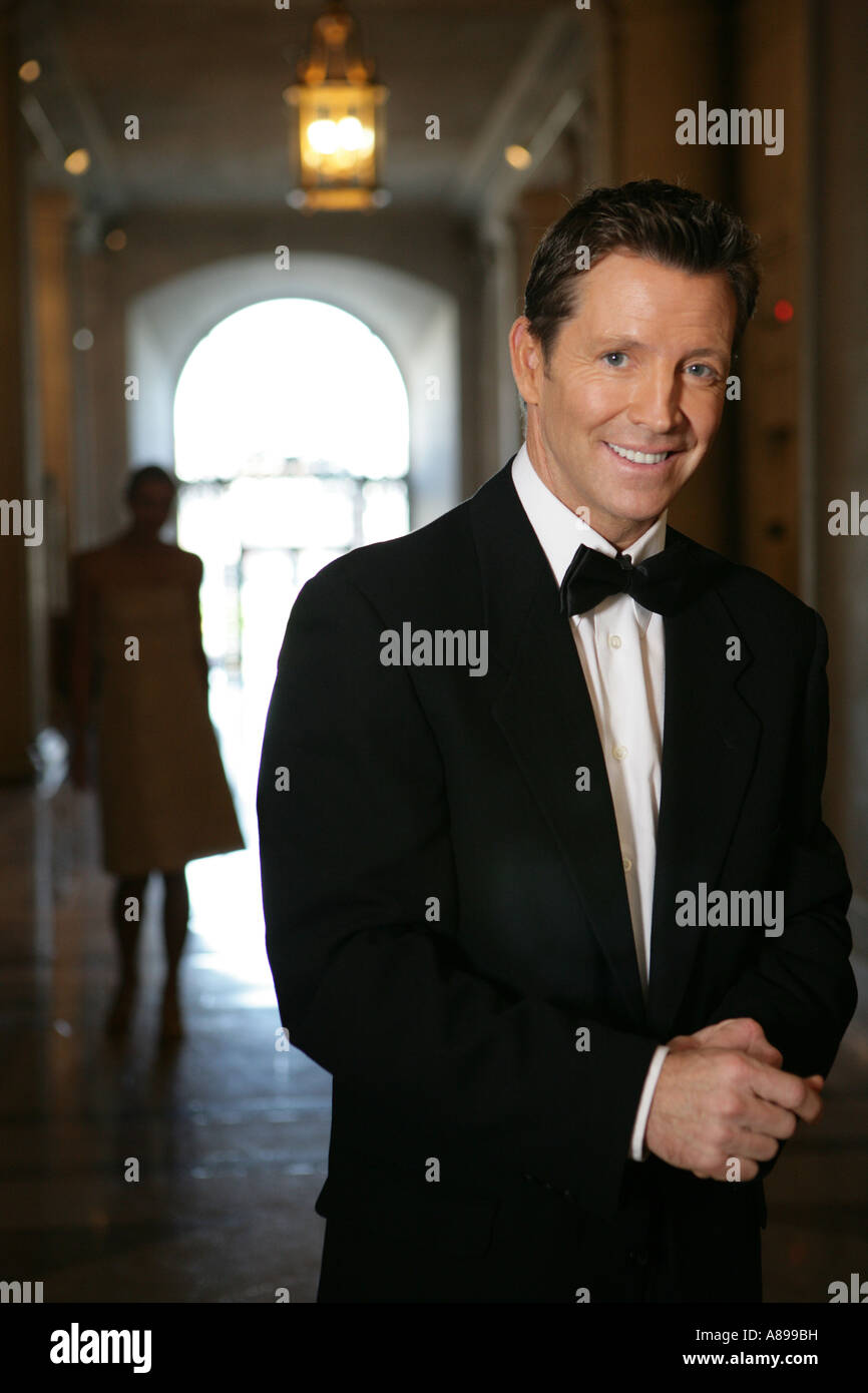 Boomer male in a tuxedo looking at camera Stock Photo - Alamy