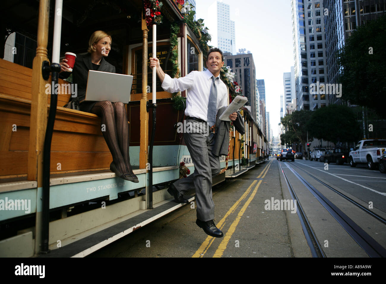 Man exiting a trolley car Stock Photo - Alamy