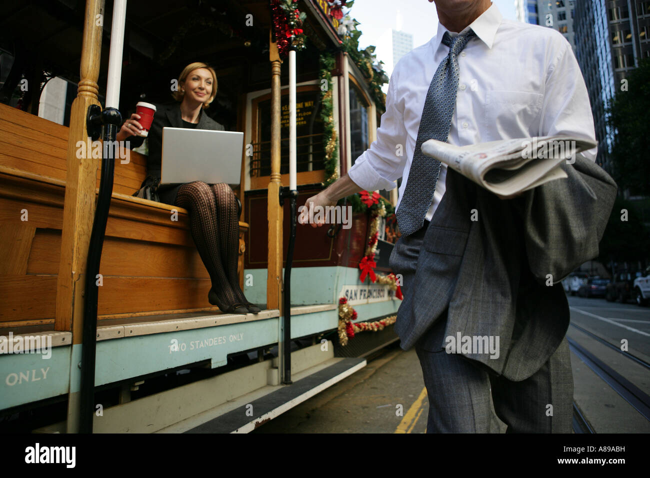 Man leaving a trolley car Stock Photo - Alamy