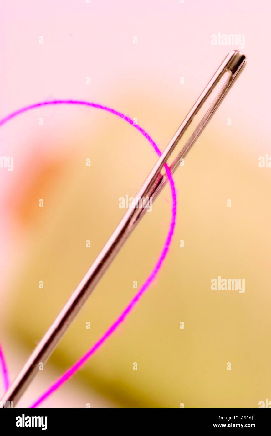 Twine with needle Stock Photo - Alamy