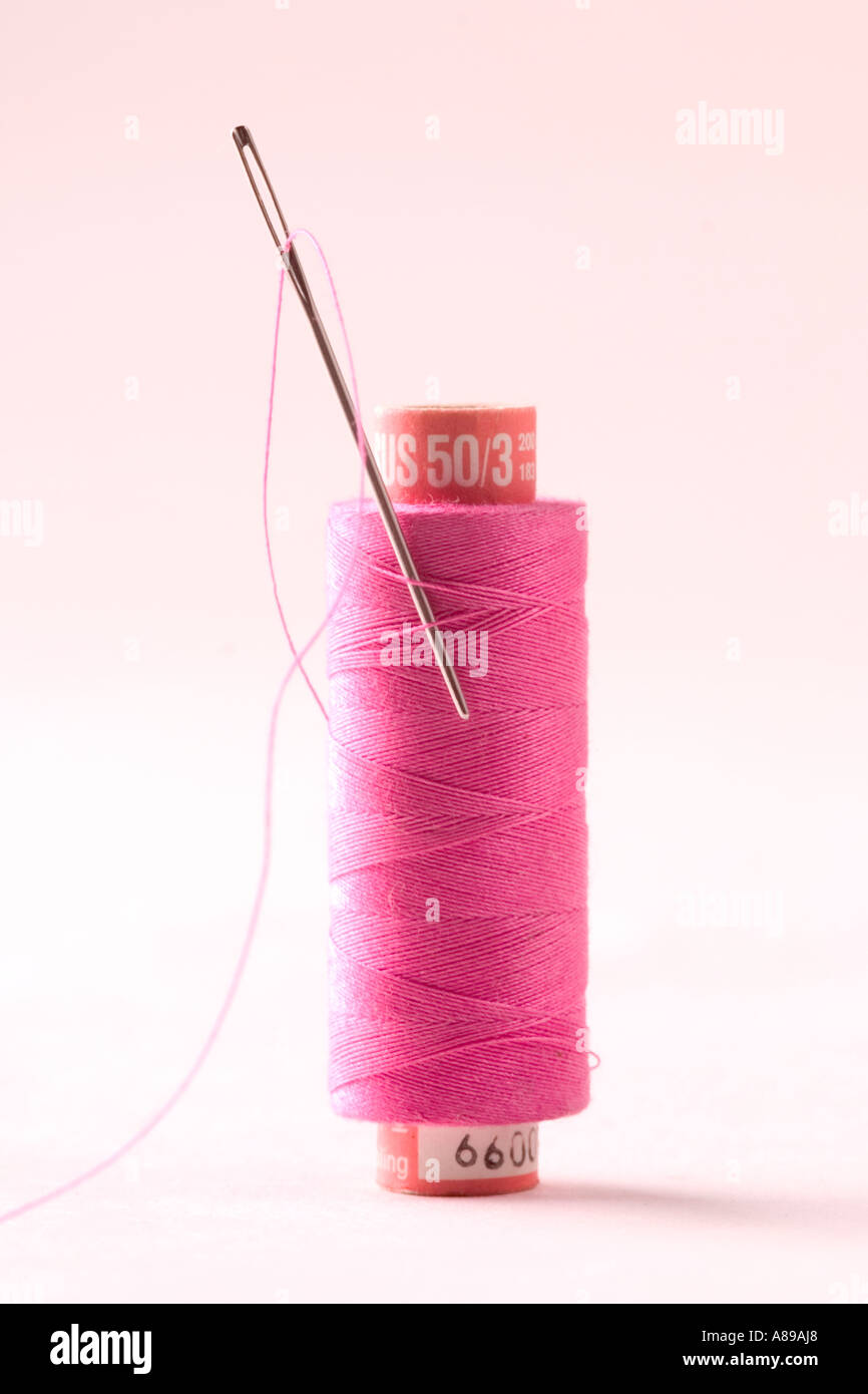 Twine with needle Stock Photo - Alamy