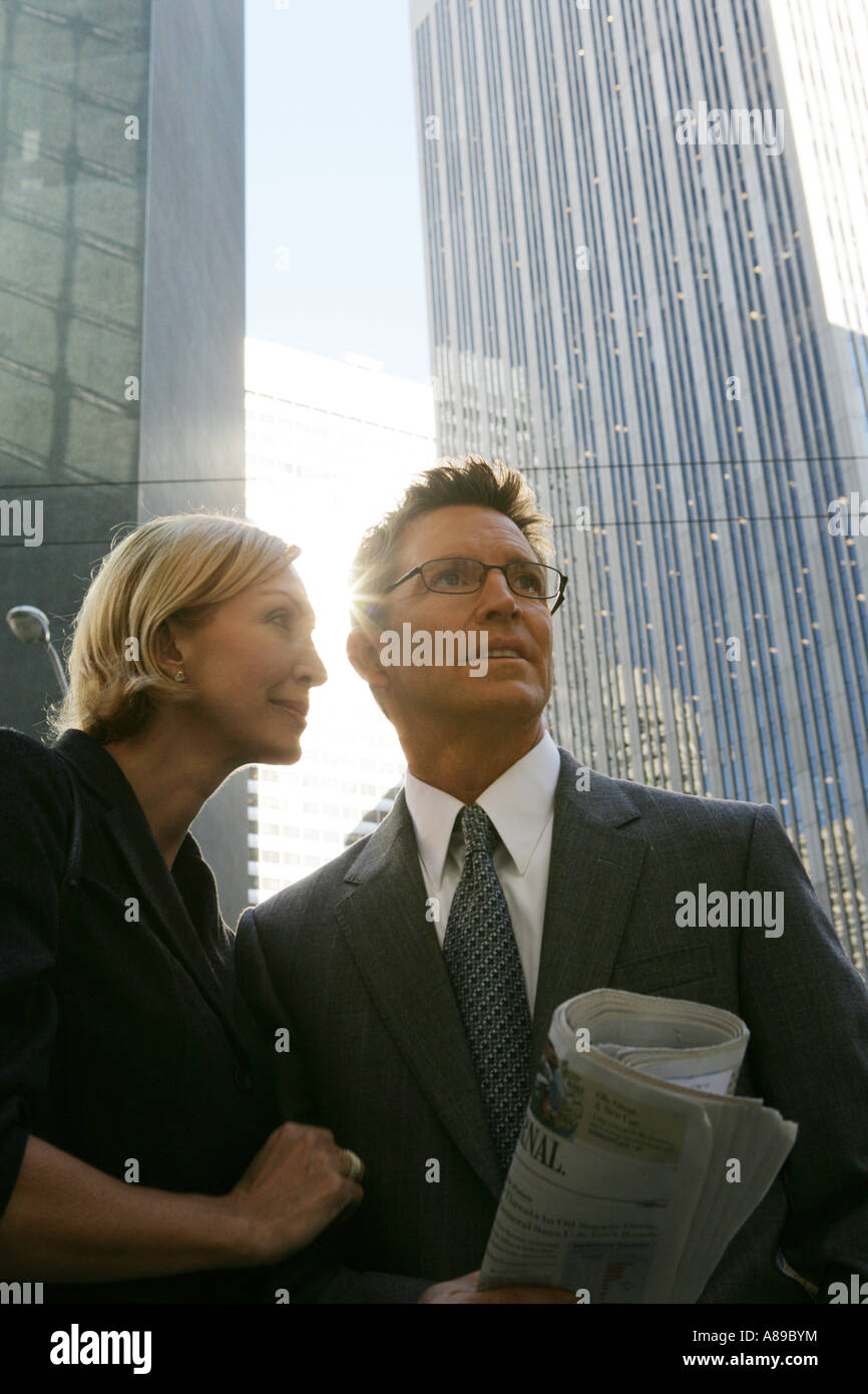 Mature couple in business suits Stock Photo - Alamy
