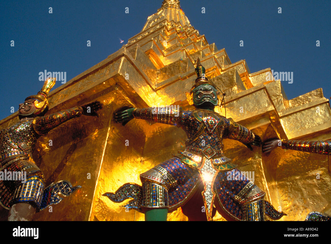 Guardian statues standing guard at The Grand Palace Bangkok Thailand ...