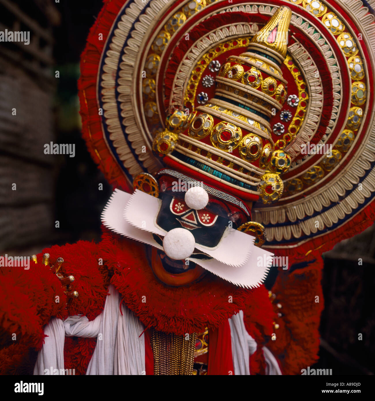 Portrait of a Kathakali dancer with his spectacular tower jewel ...