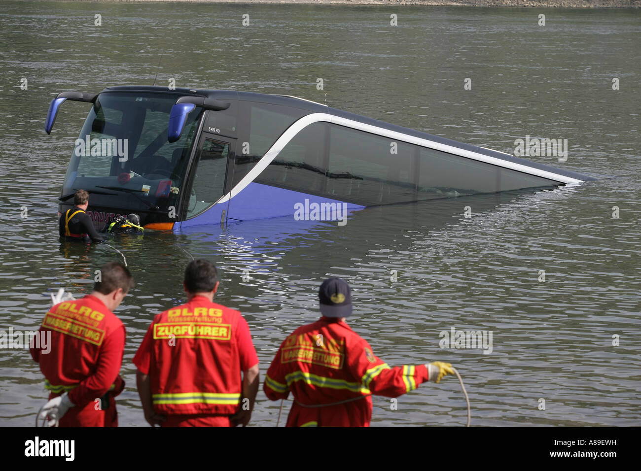 Firefighter save a motor-coach after an accident Stock Photo - Alamy