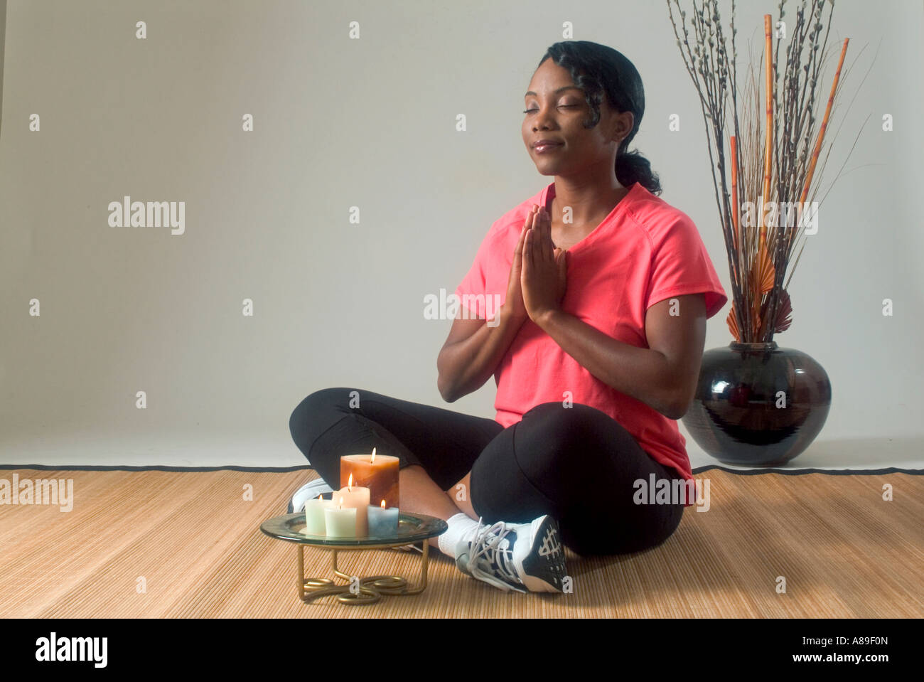 View of a young ethnic black woman performing yoga Stock Photo - Alamy
