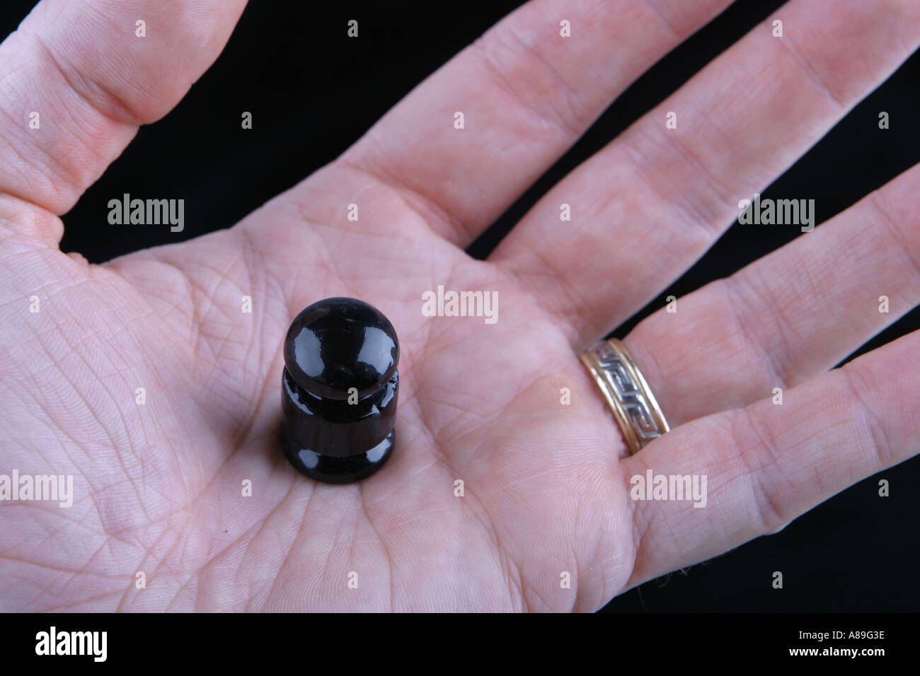 Pawn in Palm Stock Photo - Alamy