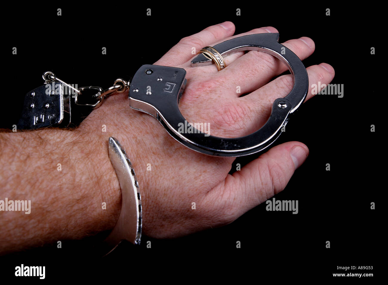 Wedding handcuff hi-res stock photography and images - Alamy
