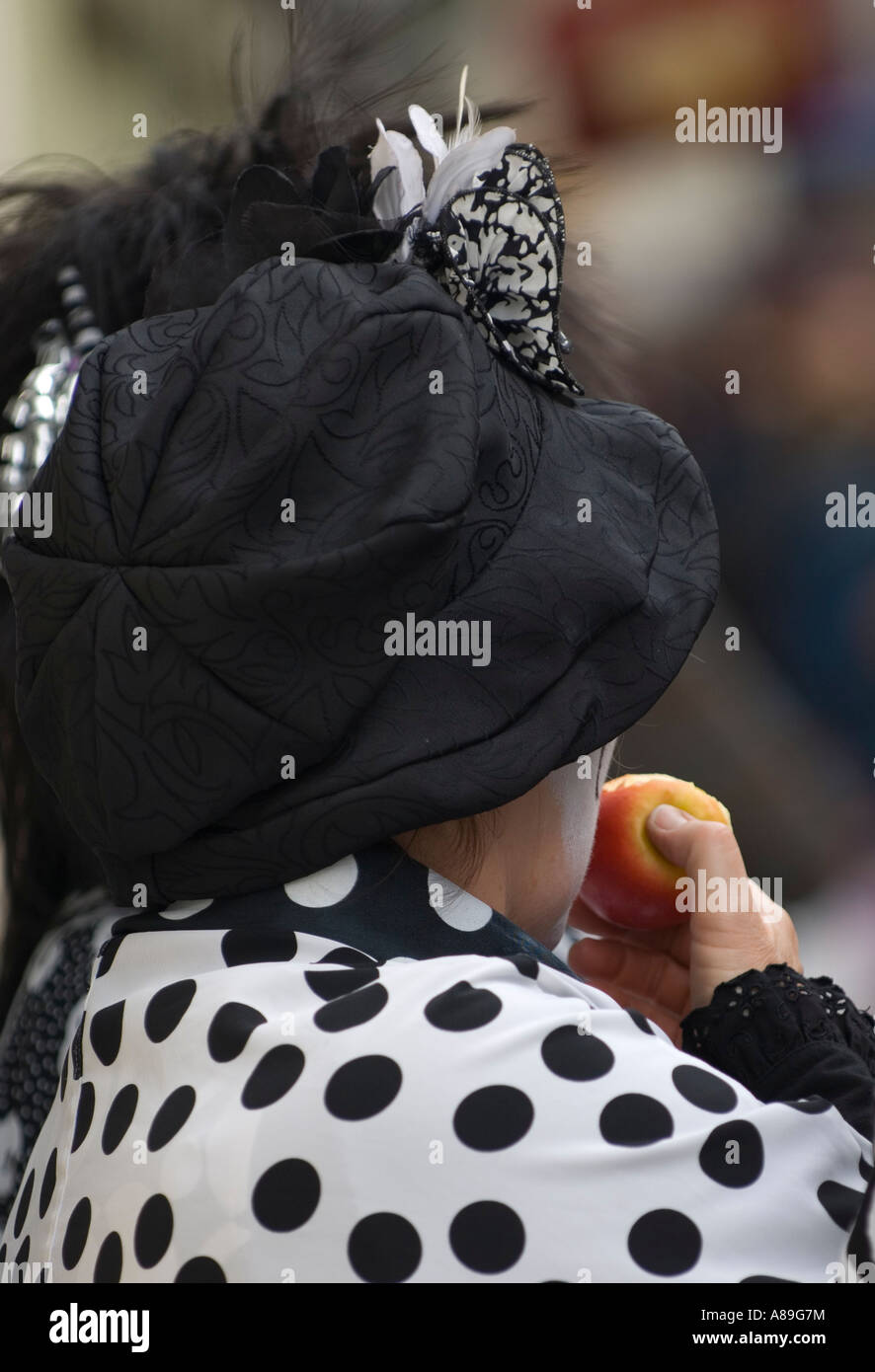 Woman wearing a black and white costume at Rochester Sweeps festival ...