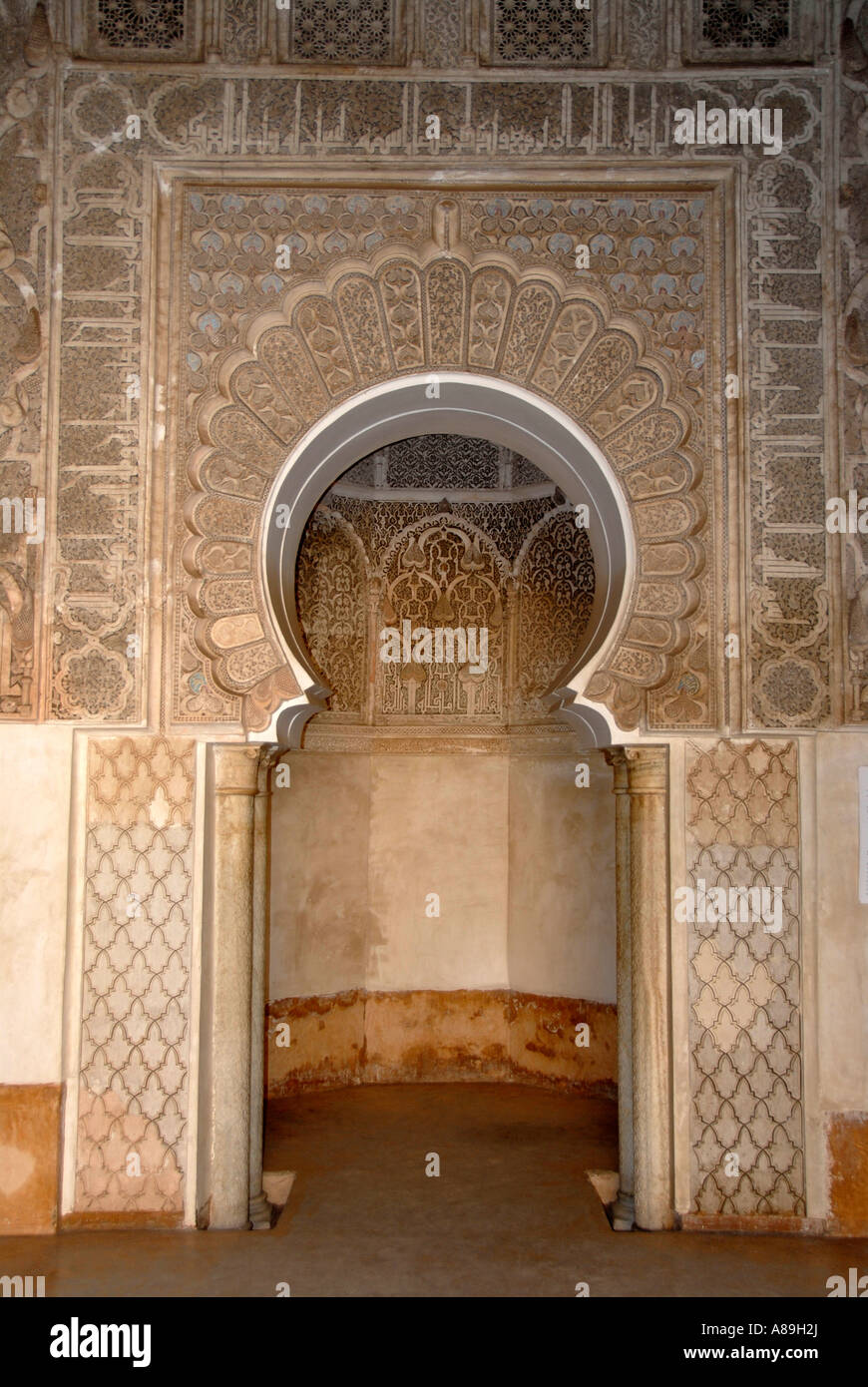 Orientally with fine stucco decorated prayer niche mihrab Medersa Ali ...