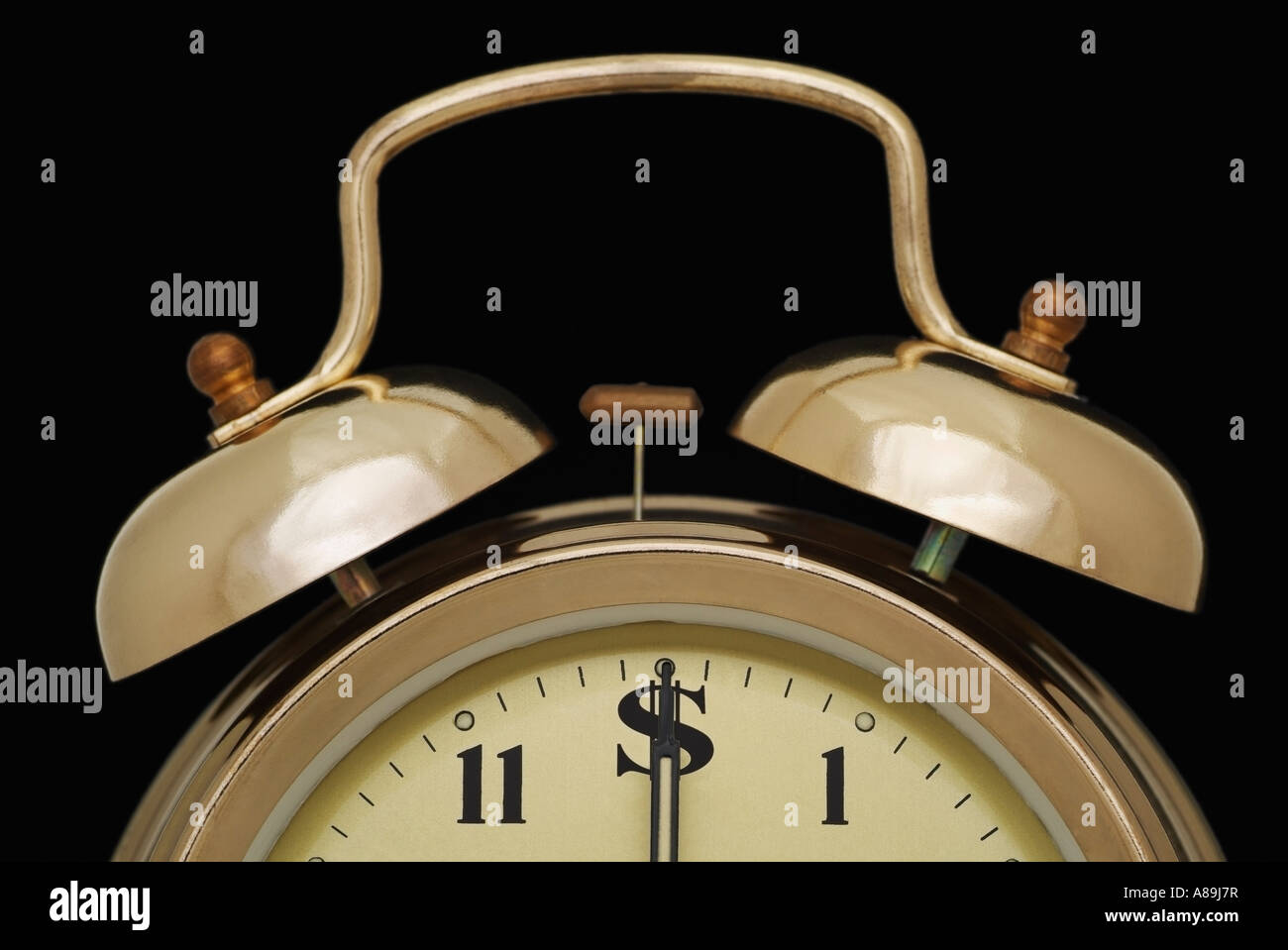 Alarm Clock With a Dollar Symbol at Twelve O'clock Stock Photo - Alamy