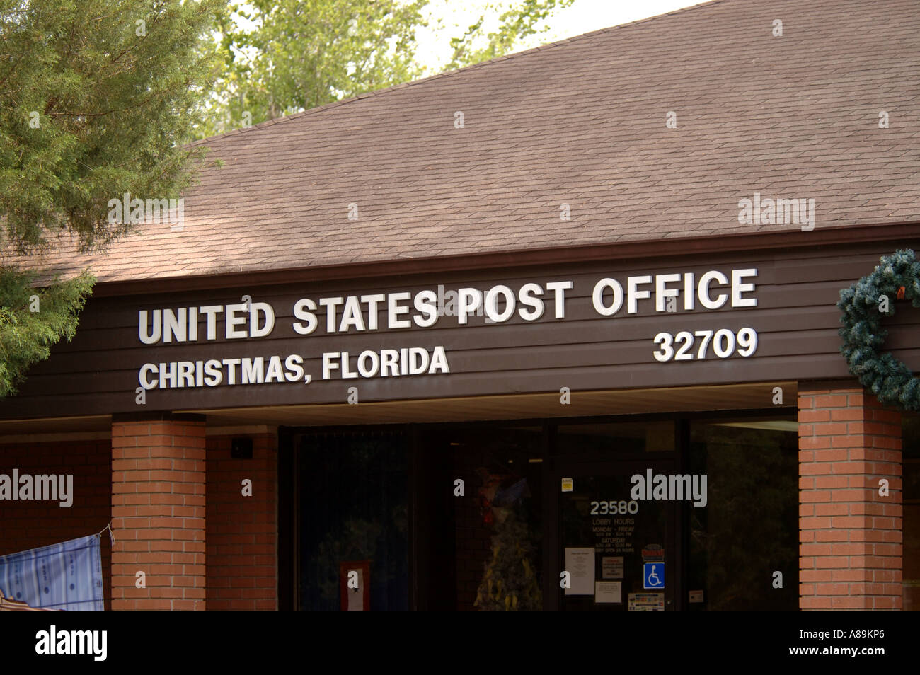 Christmas Florida United States post office sign Stock Photo - Alamy