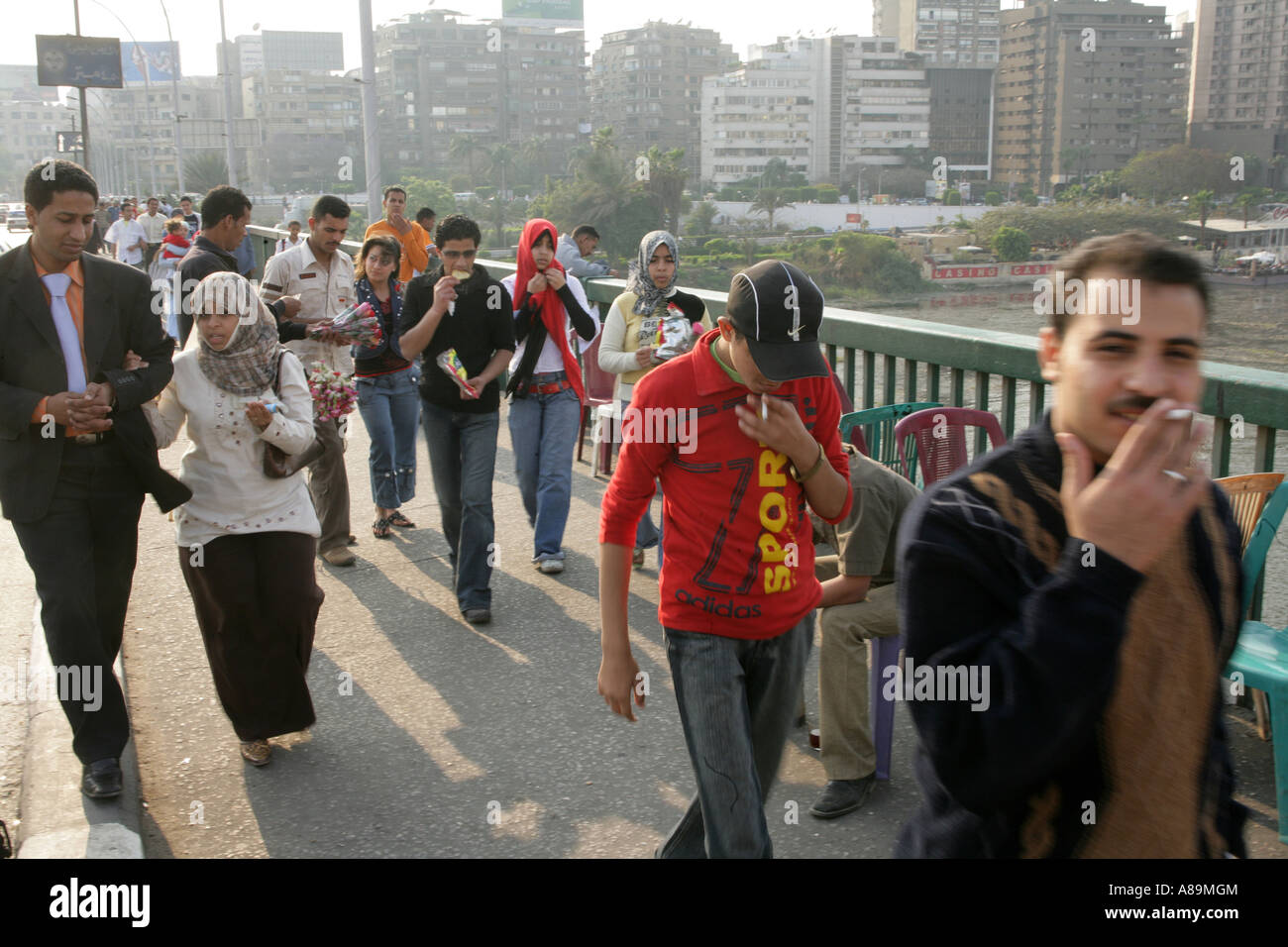 Women walking cairo hi-res stock photography and images - Alamy
