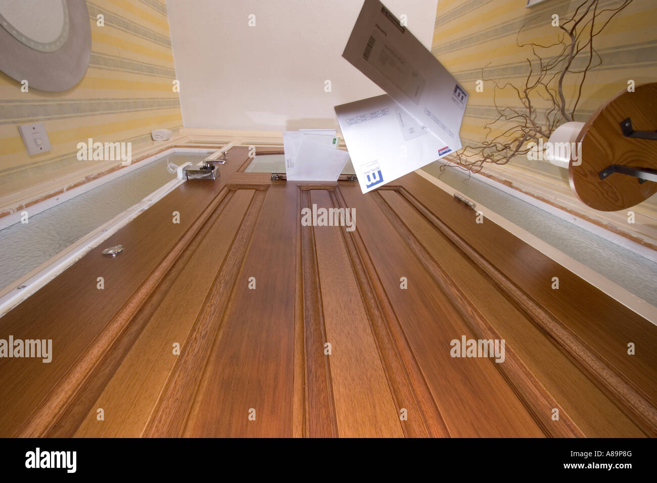looking up at mail letters post being delivered to house through ...