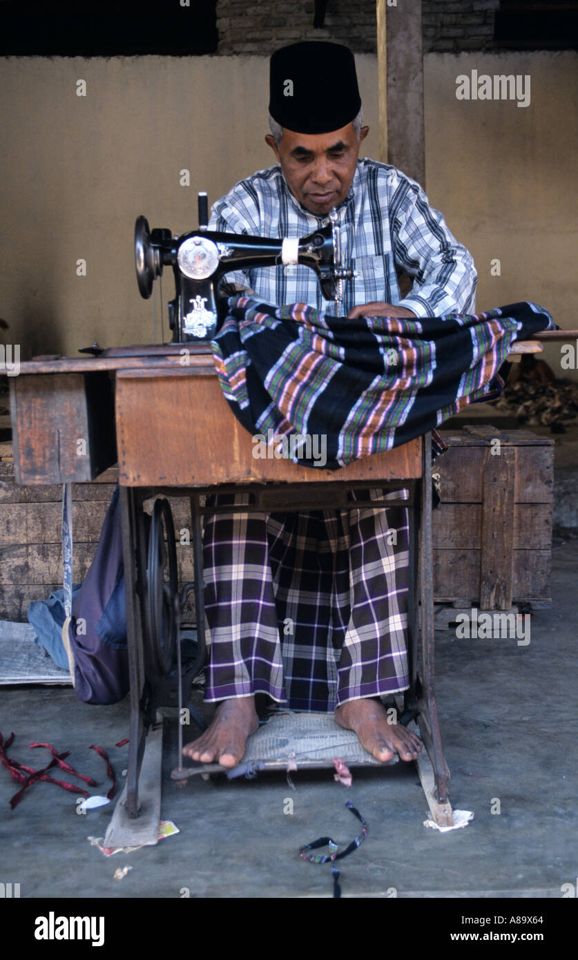 Indonesia Man tailoring clothes Stock Photo - Alamy