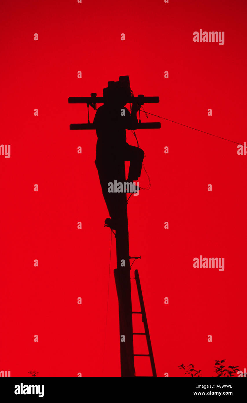 Engineer climbing red telecom hi-res stock photography and images - Alamy