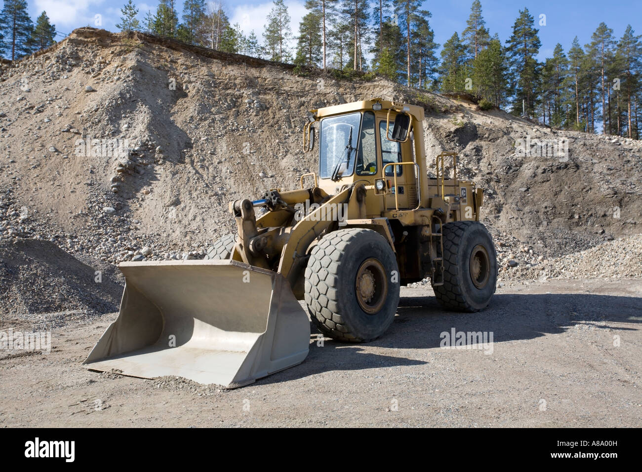 Front loader at gravel extraction area, Sotkamo Finland Stock Photo - Alamy