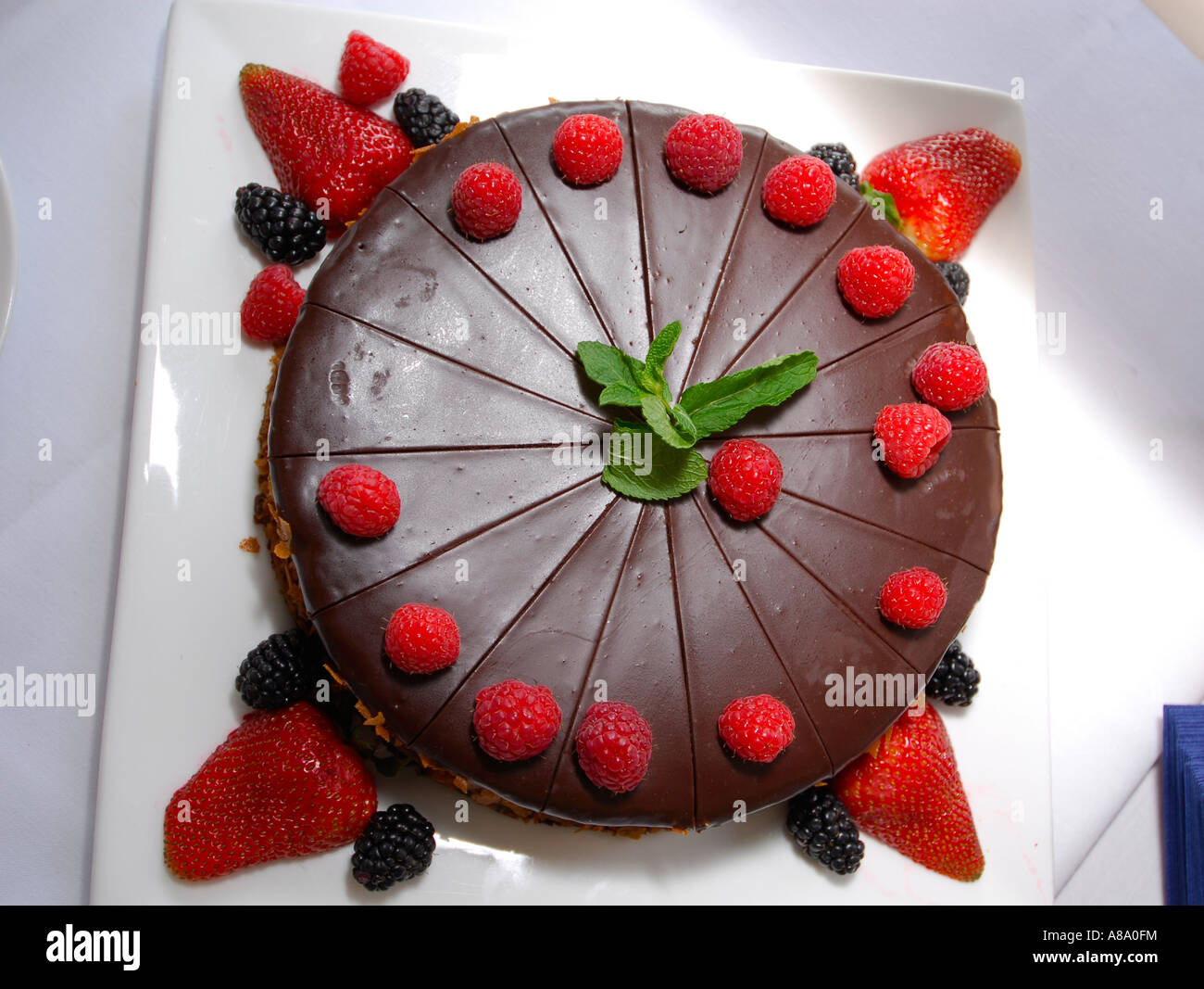 Chocolate cake with berries Stock Photo - Alamy