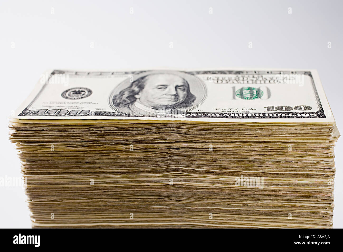 Stacks of dollars Stock Photo - Alamy