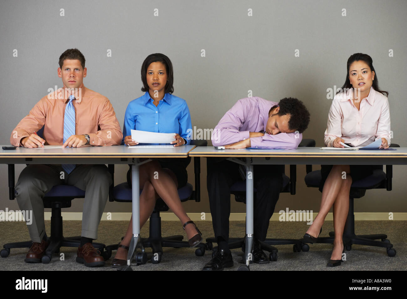 Businessman sleeping during meeting in hi-res stock photography and ...