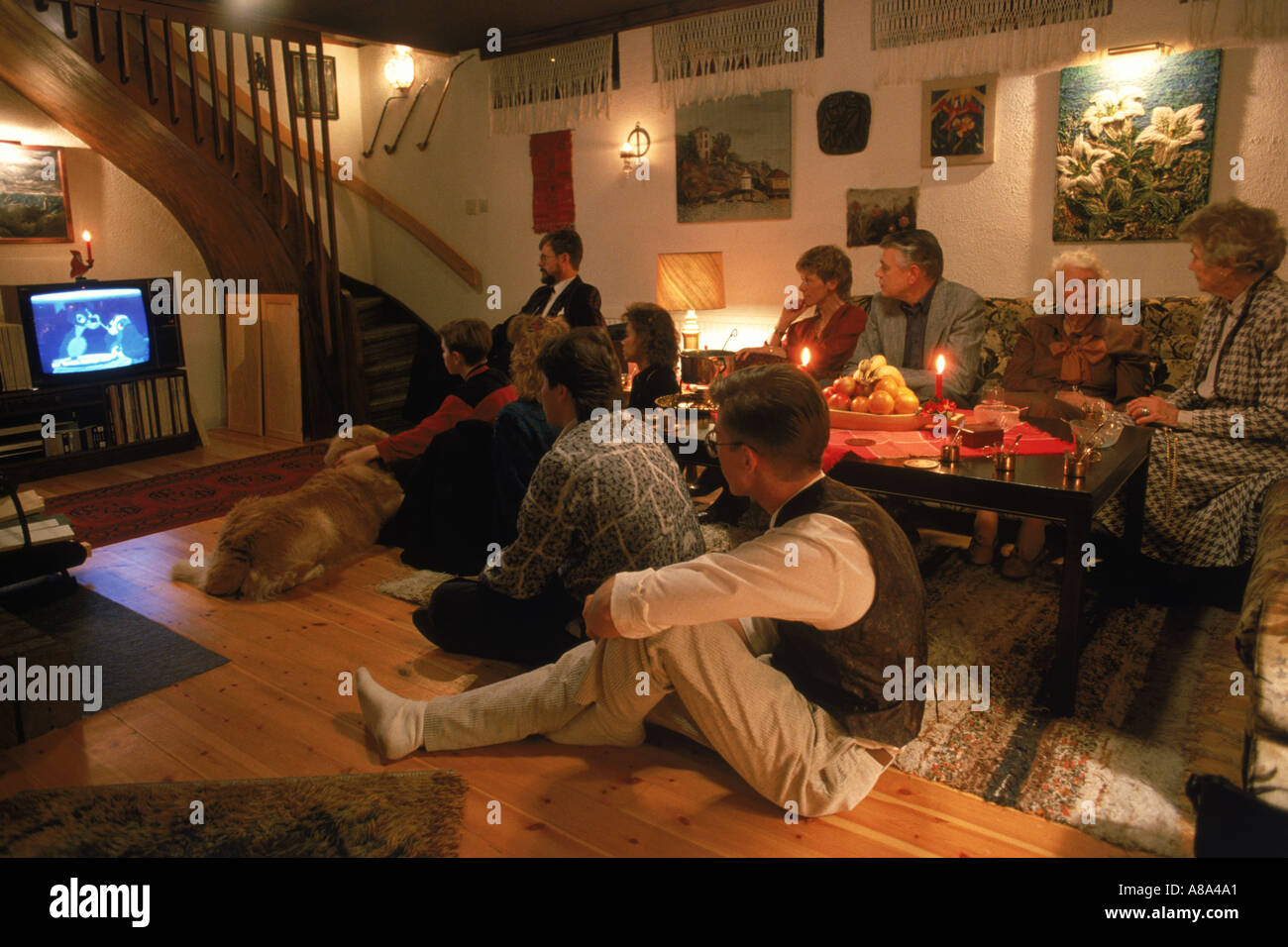 Three generations family watching tv hi-res stock photography and ...