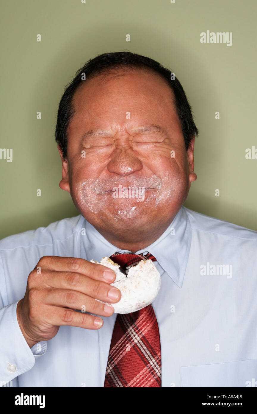 Person eating messy adult hi-res stock photography and images - Alamy
