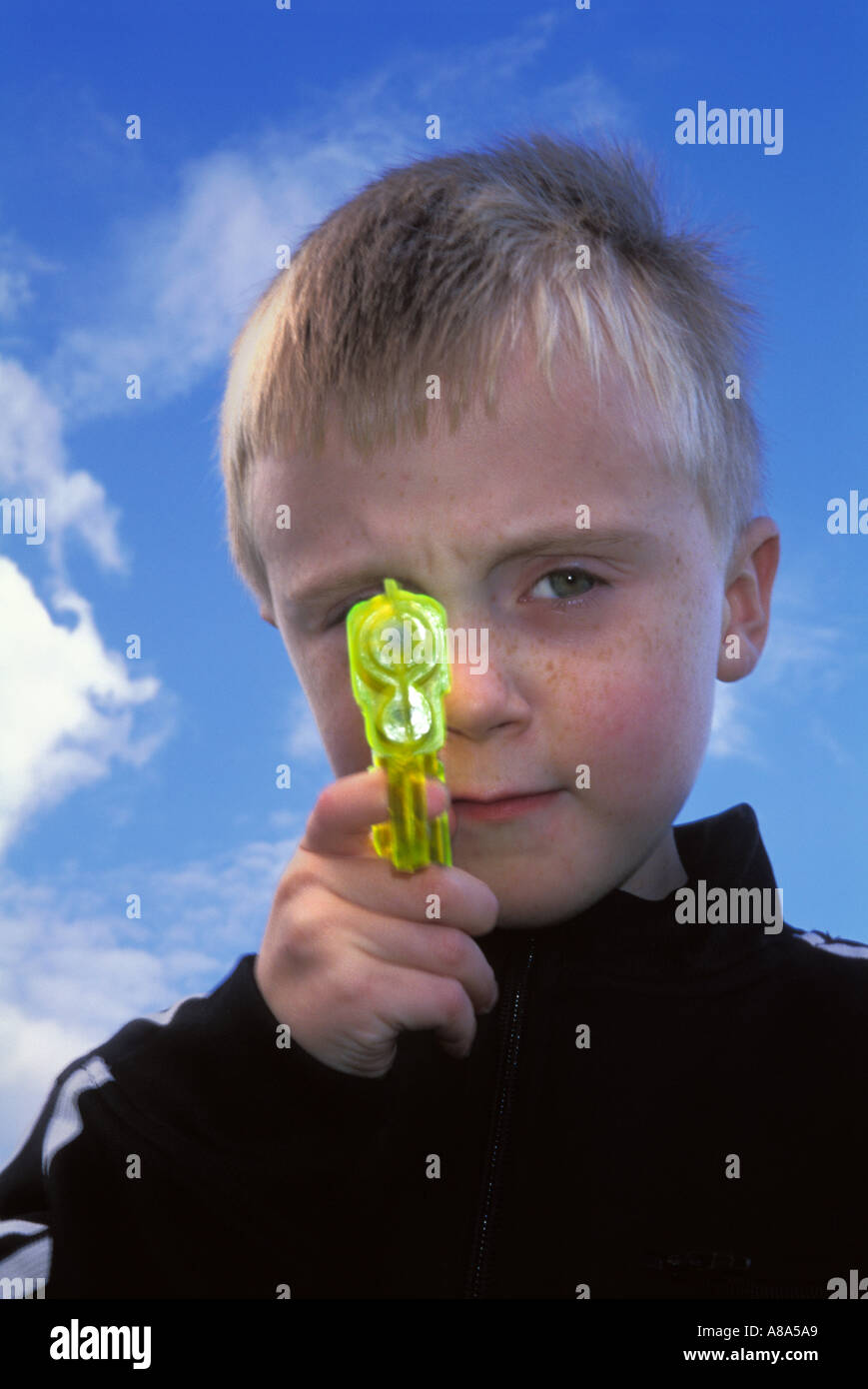 five year old boy with water pistol Stock Photo - Alamy