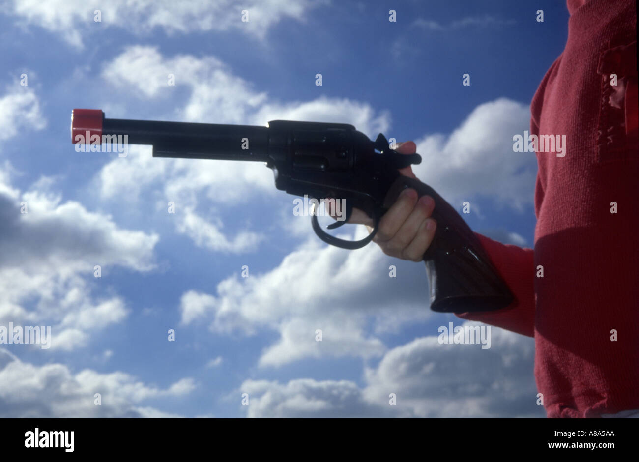 Boy pointing gun hi-res stock photography and images - Alamy