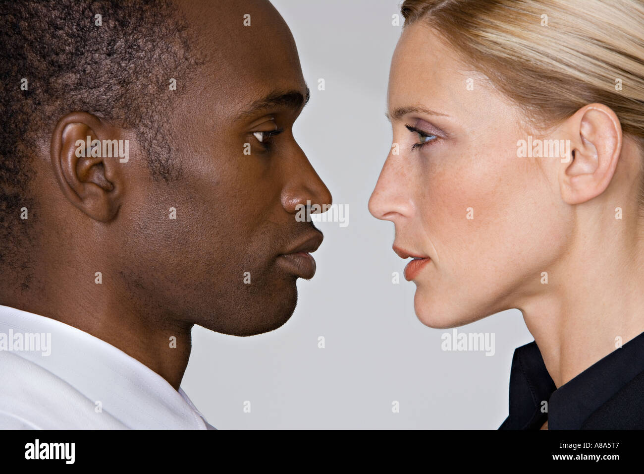 Man and woman face to face Stock Photo - Alamy
