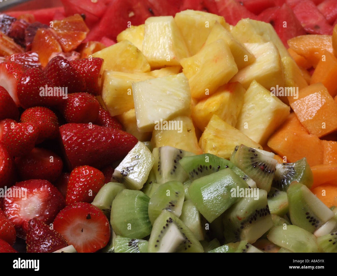 fruit salad chunks Stock Photo - Alamy