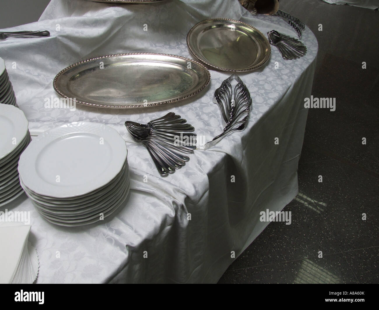 set of forks on buffet table Stock Photo - Alamy